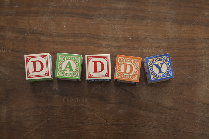 Daddy in wooden blocks ~ Abstract Photos on Creative Market