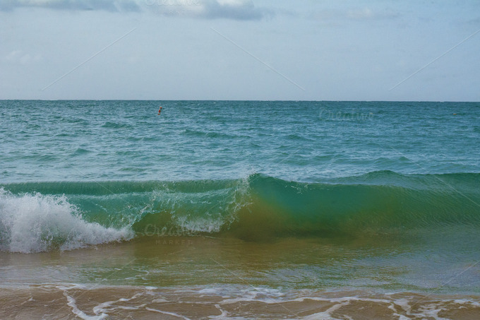 Waves Breaking on Beach ~ Nature Photos on Creative Market